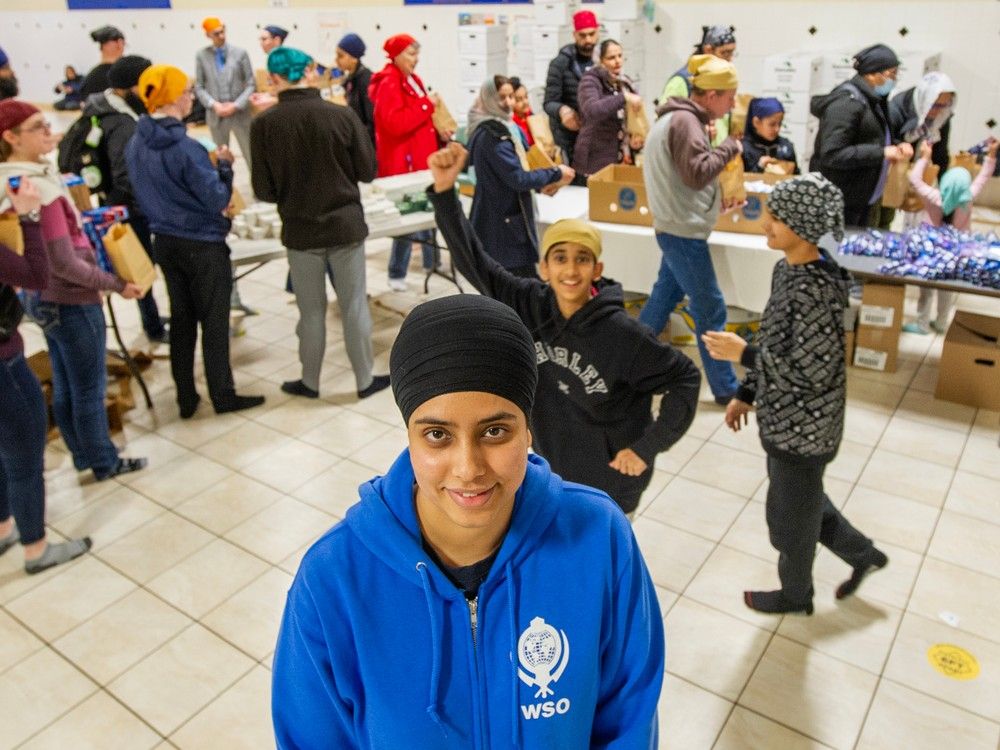 Volunteers gather on Family Day to prepare care packages for women ...