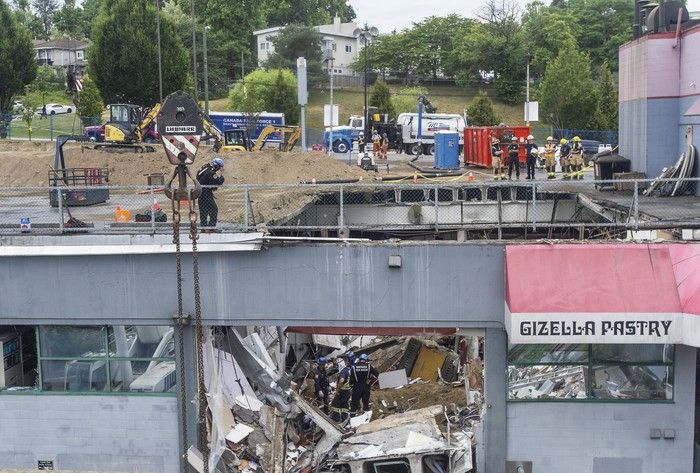BMW shop in Vancouver building where roof collapsed sues owner, roofer ...