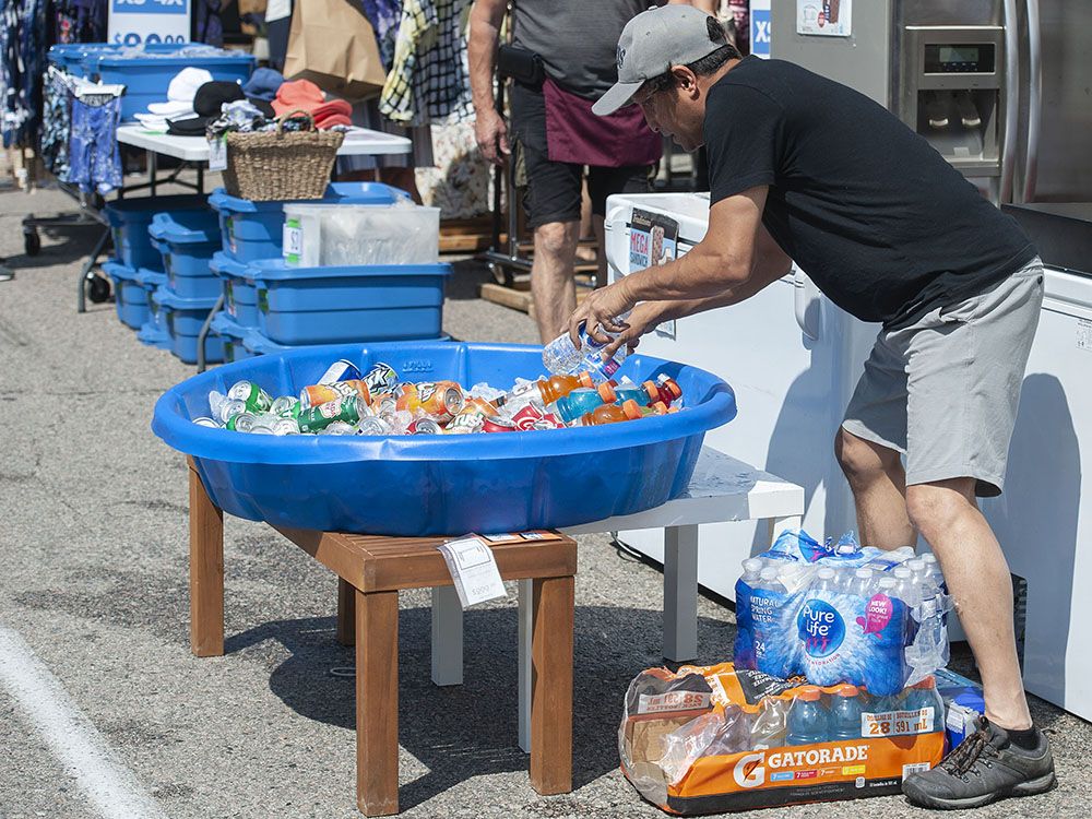 Vancouver mayor Ken Sim shotguns beer at Khatsahlano Street Party ...