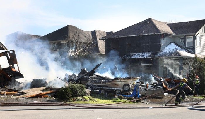 Two people in critical condition after fire and explosion in Langley ...