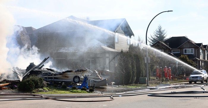 Two people in critical condition after fire and explosion in Langley ...