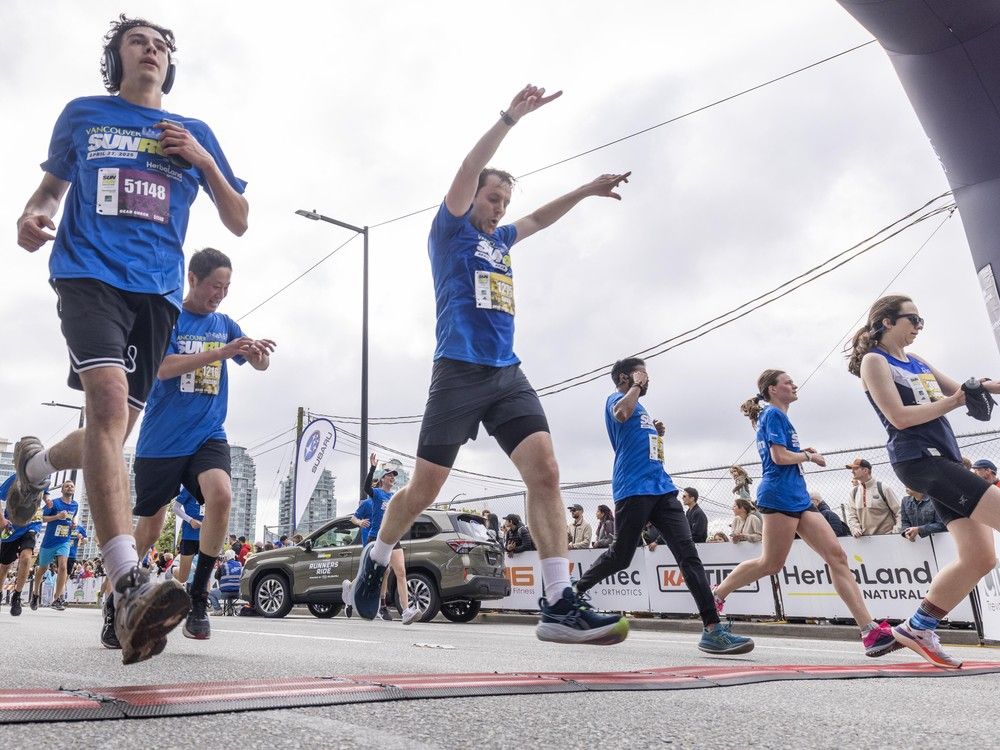 Photos: Tens of thousands join together in Vancouver Sun Run 2025 ...