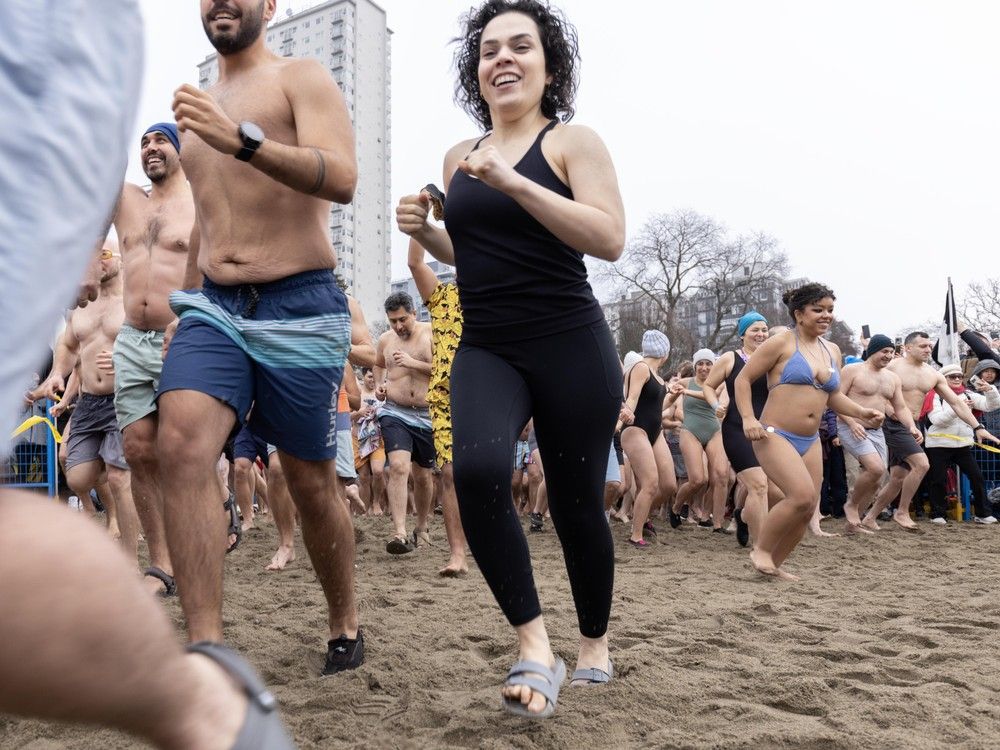 English Bay Polar Bear Swim draws thousands | Vancouver Sun