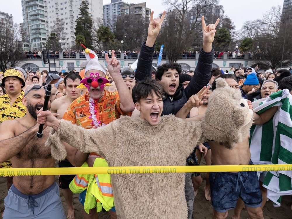 English Bay Polar Bear Swim draws thousands | Vancouver Sun