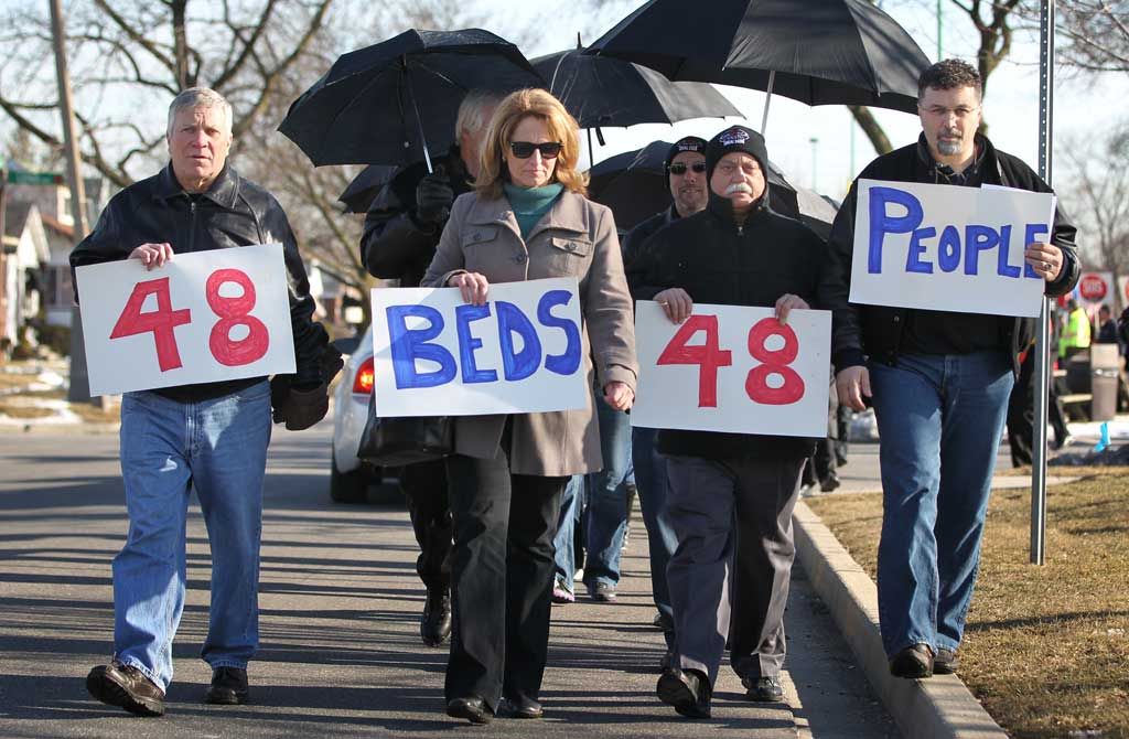 Umbrellas used to protest bed funding at Windsor Regional | Windsor Star