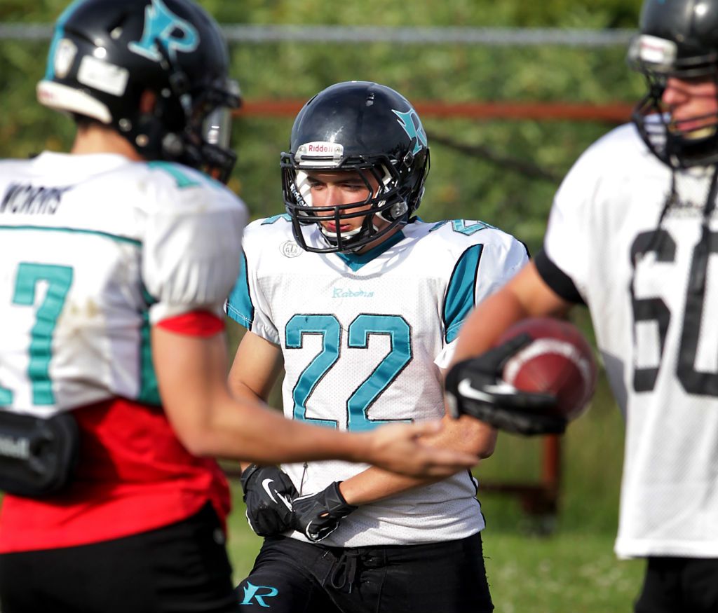 Ravens ride roughshod over Riders | Windsor Star