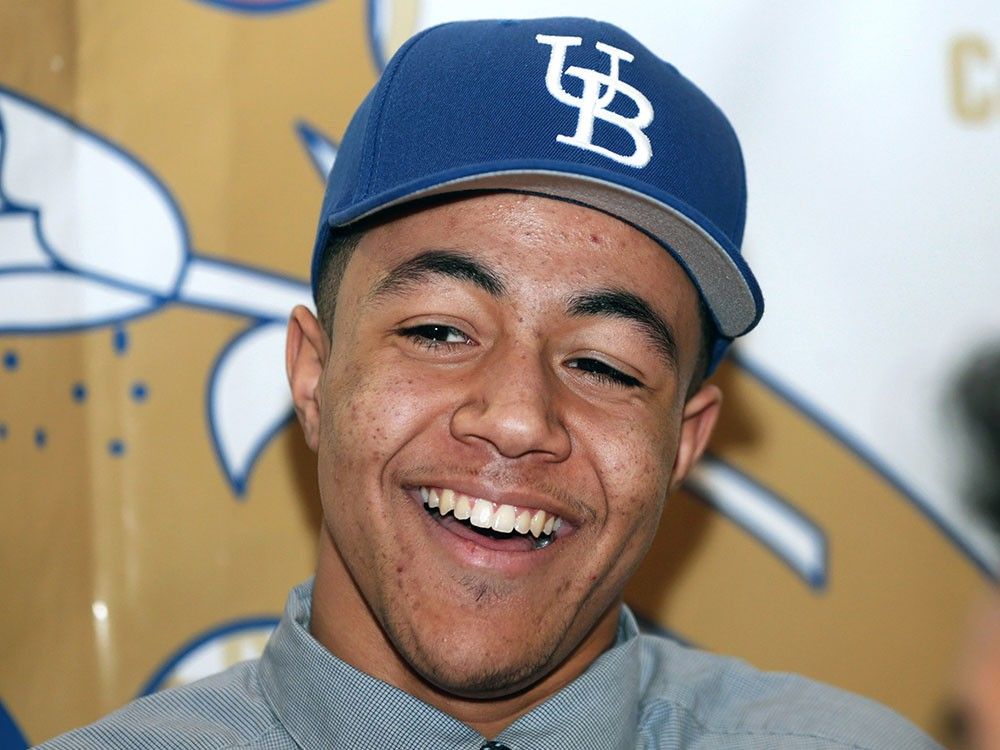 Catholic Central's Dominic Johnson signs NCAA deal with University of ...