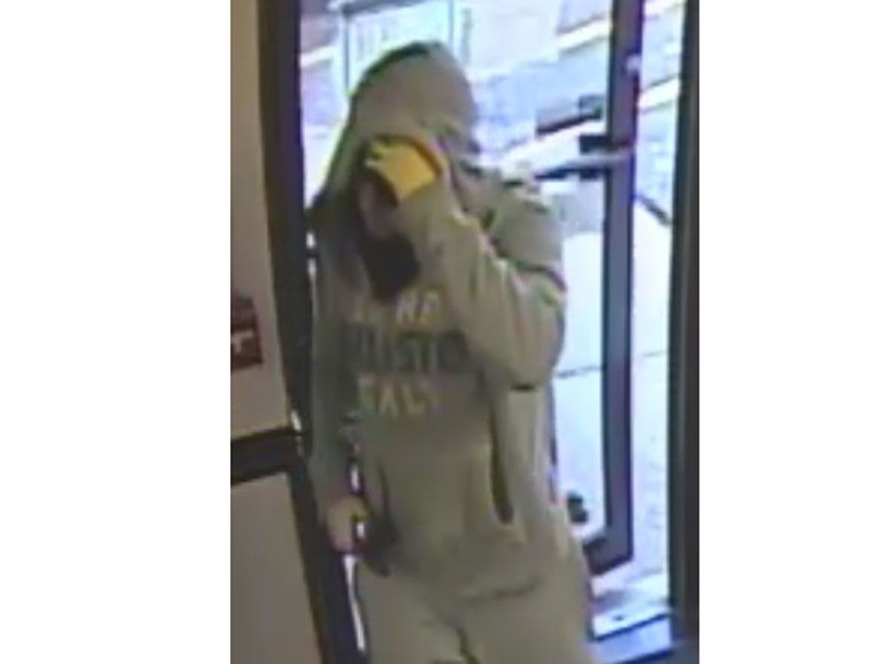 Police release surveillance photo of knife-wielding pharmacy robber ...