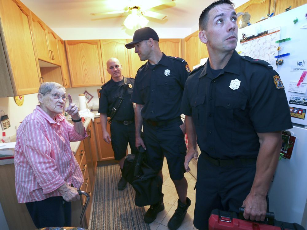 Photos: Firefighters follow Meals on Wheels for fire safety blitz ...
