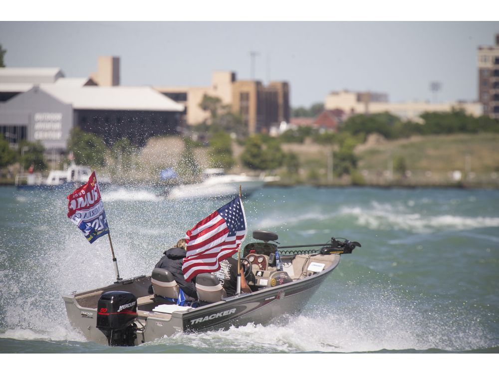 Trump supporters parade along Detroit River for president's 74th ...