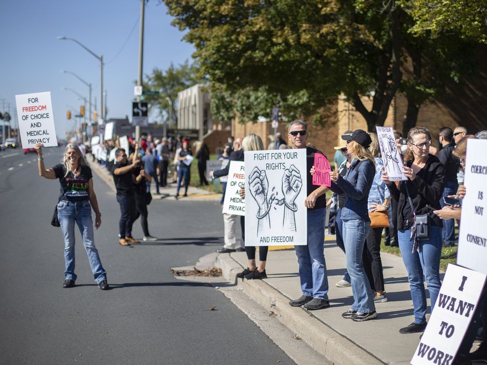 Group protests mandated vaccine policy outside Met Campus Hospital ...