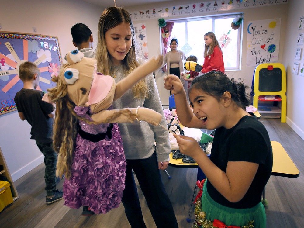 Holy Names students share therapeutic puppets with autistic children ...