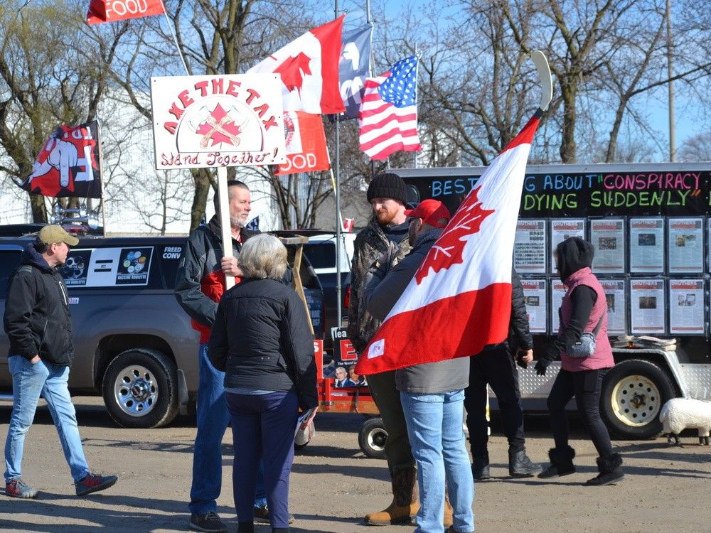 Police limit Ambassador Bridge access as anti-Trudeau protesters rally ...