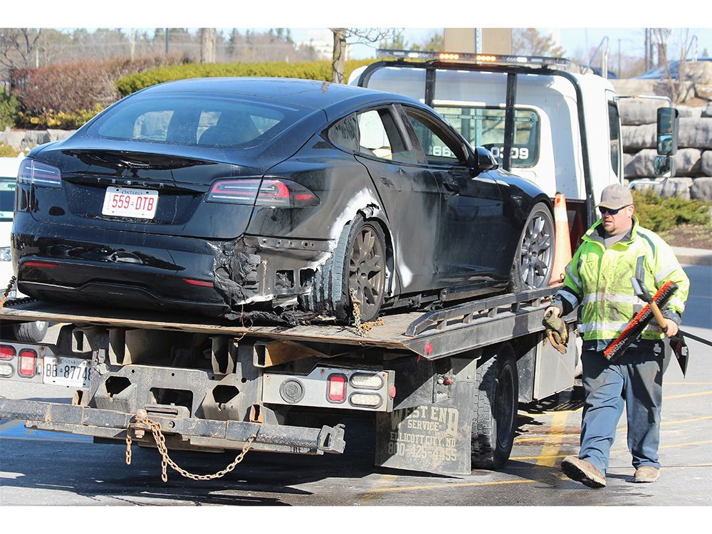 Elon Musk anger? Police probe Tesla car fire at London shopping mall ...