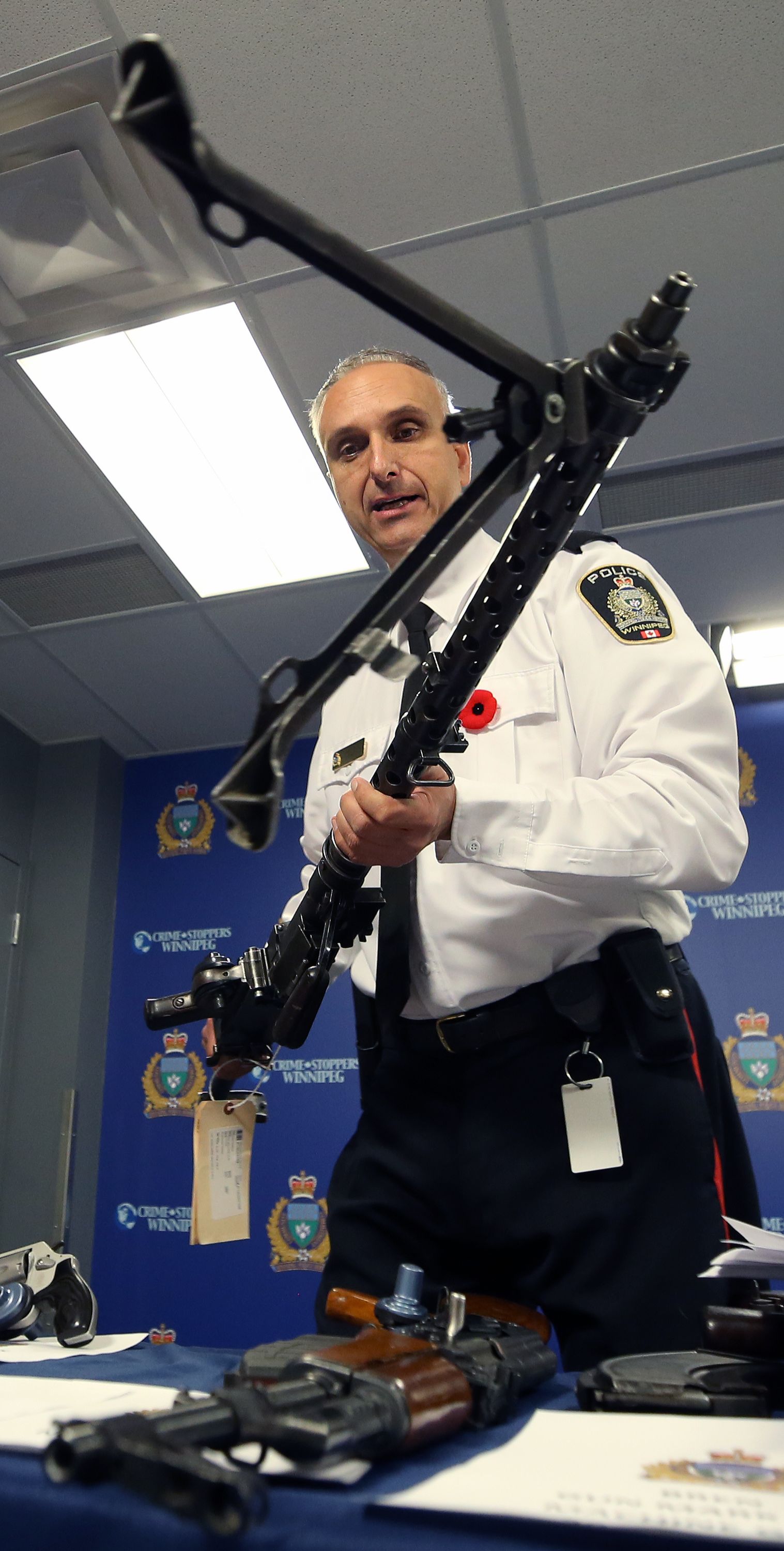 Massive gun seizure leads to 70 charges for one man | Winnipeg Sun