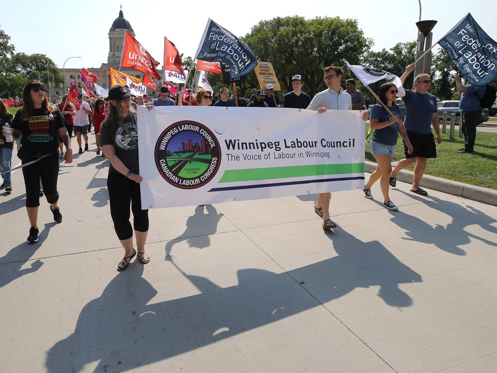 Union members march to mark Labour Day with first parade since 2019 ...
